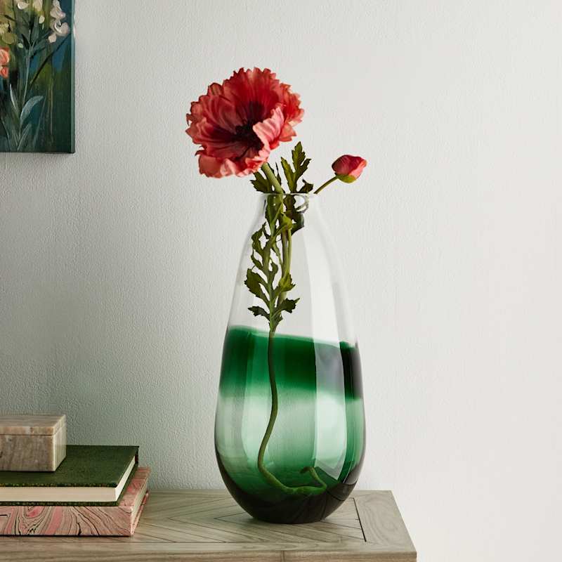 Add elegance to your home with this green and clear glass vase by Found ...